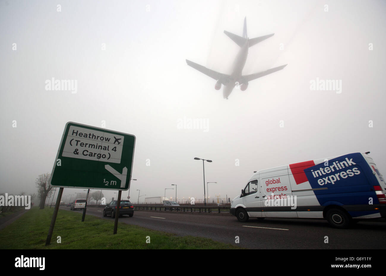 Planes land in fog at Heathrow Airport, west London, as heavy fog ...