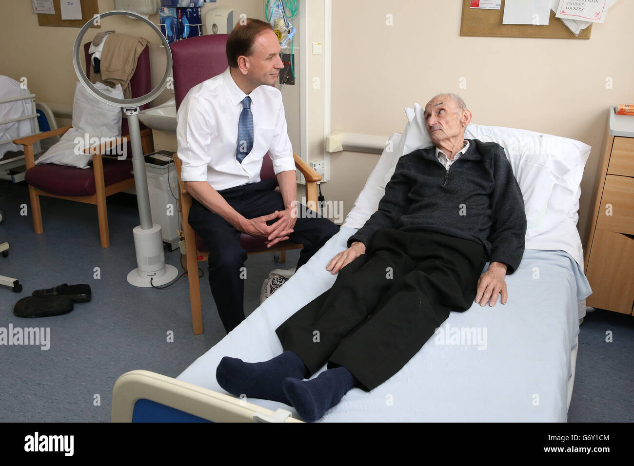 The new chief executive of NHS, Simon Stevens (left) meets Patient John ...