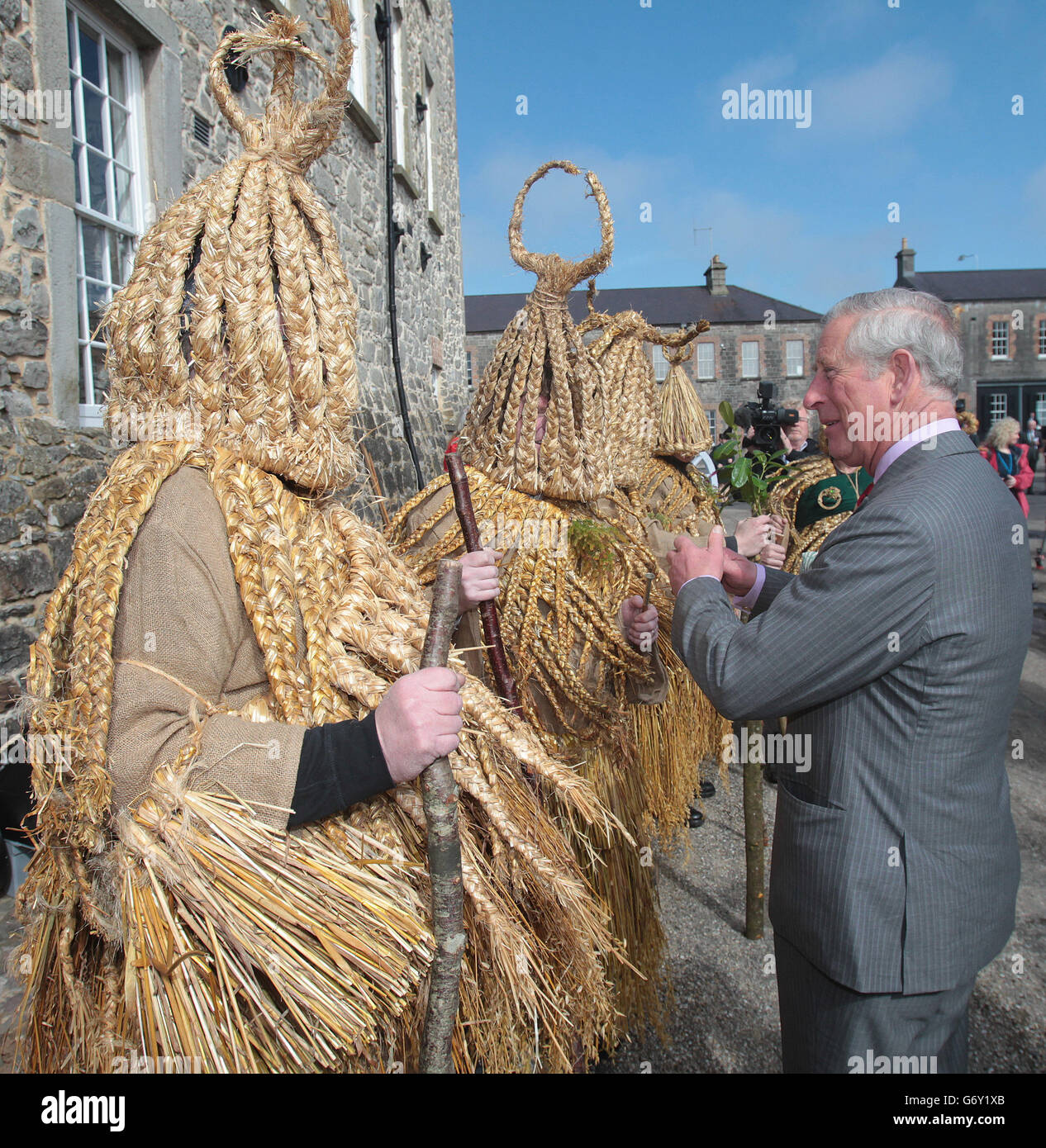 The Prince of Wales (right) meets a group of Irish Mummers at ...