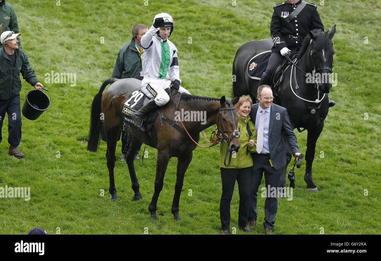 Jockey Leighton Aspell celebrates winning the Crabbies Grand National ...