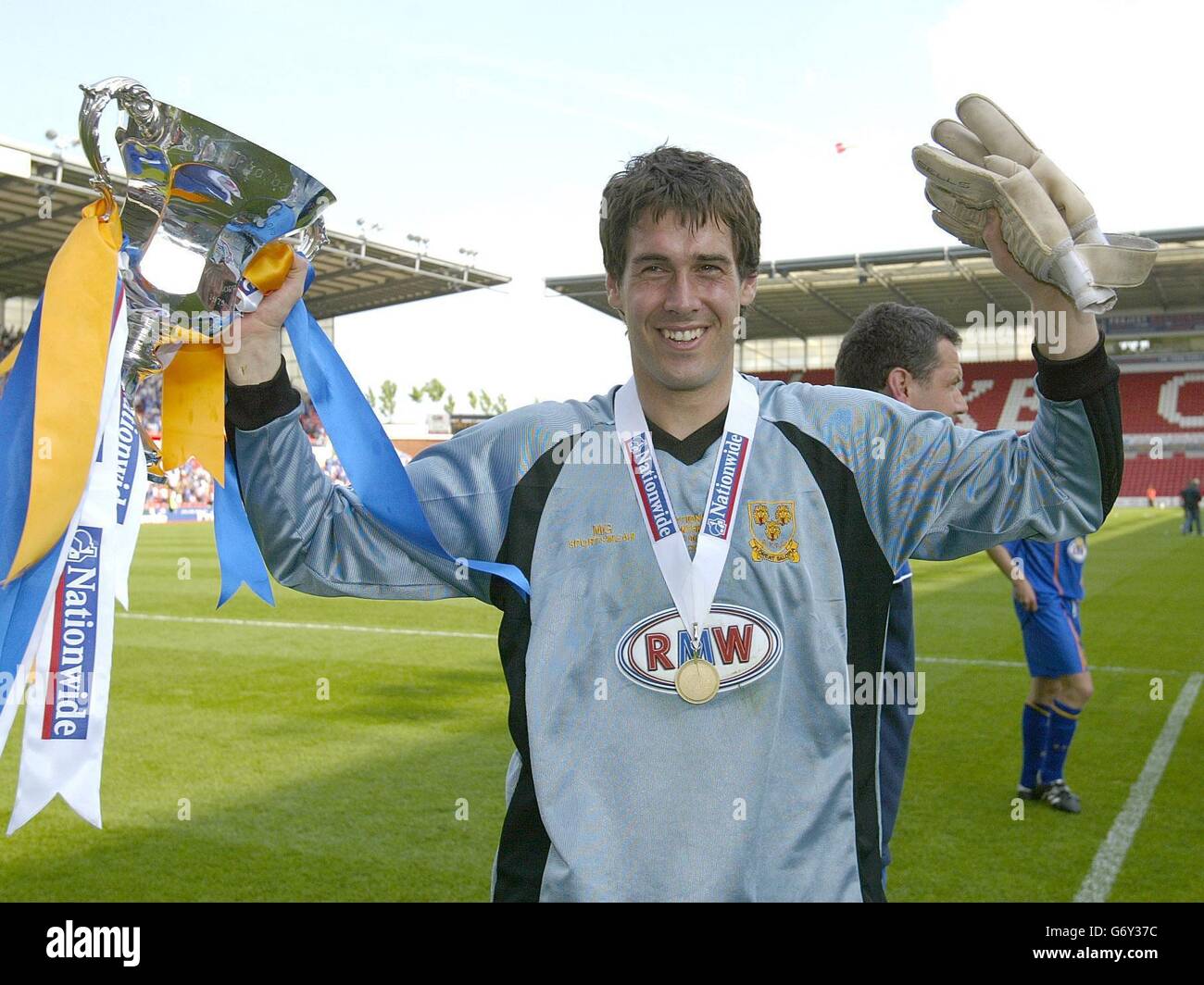Shrewsbury goalkeeper Scott Howie with the cup after his teams 4-1 ...
