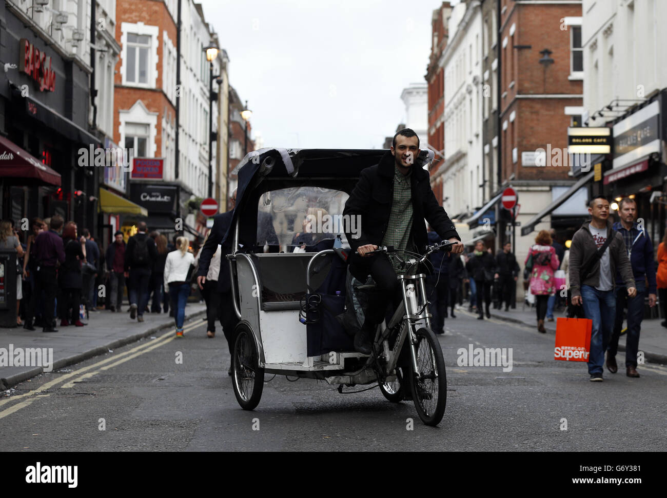 London transport stock. Rickshaw in Soho Stock Photo - Alamy