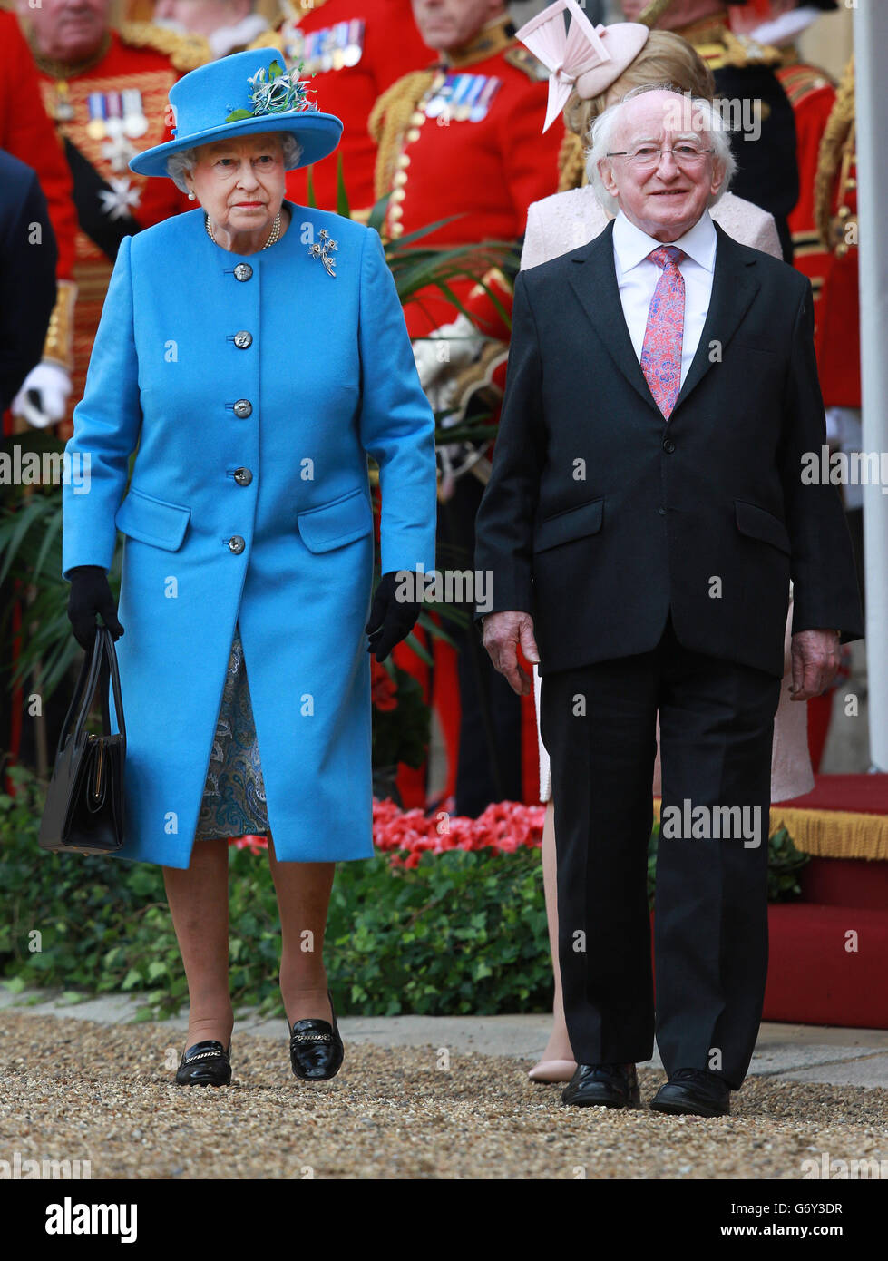Queen Elizabeth II walks with President of Ireland Michael D Higgins at ...