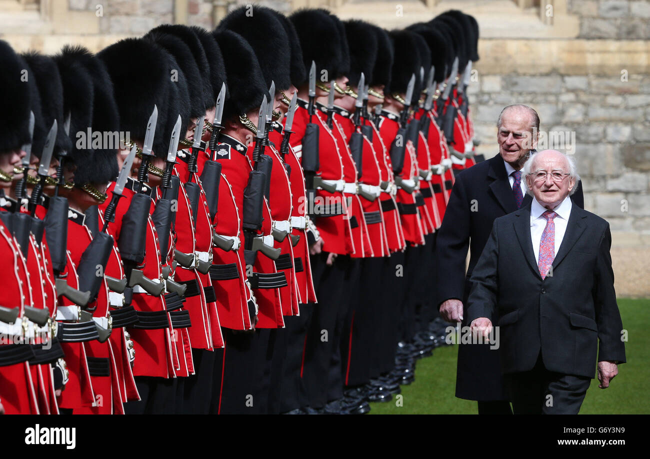 The President of Ireland Michael D Higgins (right) inspects a Guard of ...