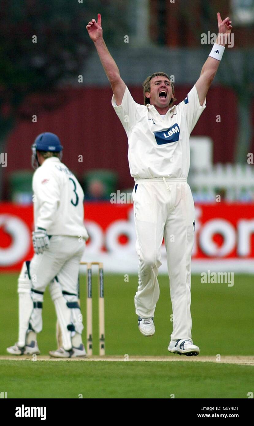 Lancashire bowler Dominic Cork celebrates the wicket of Sussex batsman ...