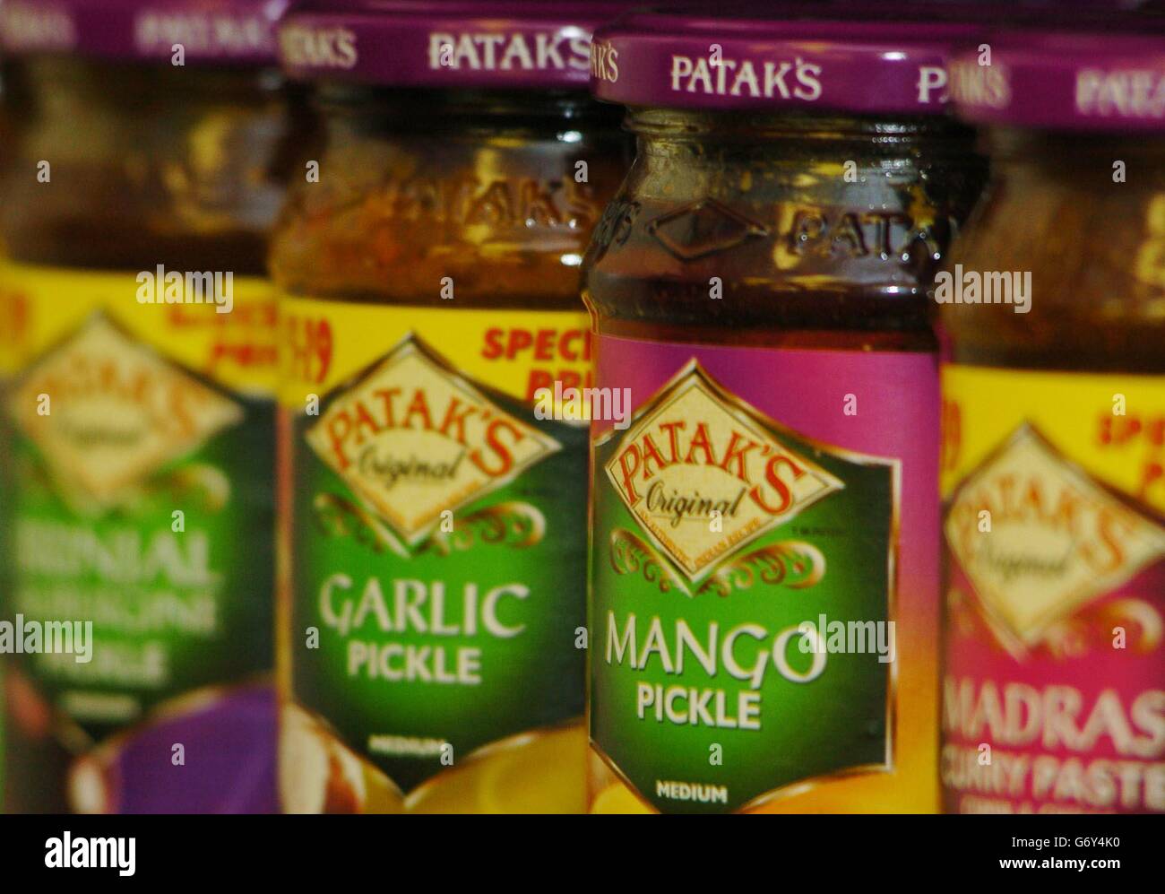 Jars of Patak's cooking sauces stand in a shop in London. A bitter ...