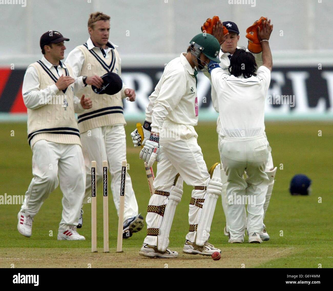 Kent players celebrate the wicket of Stephen Peters (batsman) taken by ...
