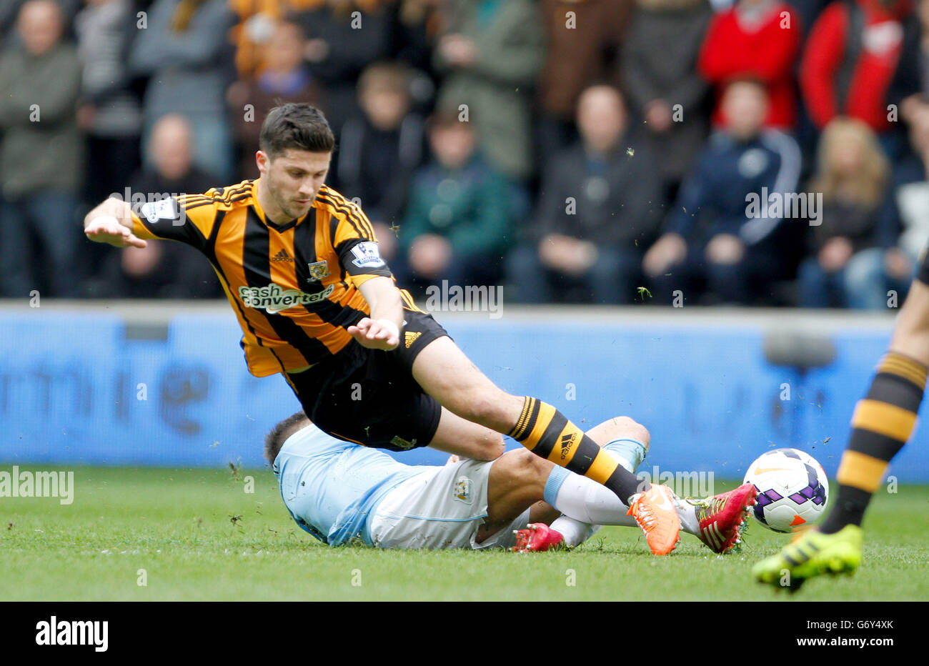 Hull's Shane Long (right) and Manchester City's Javier Garcia challenge ...