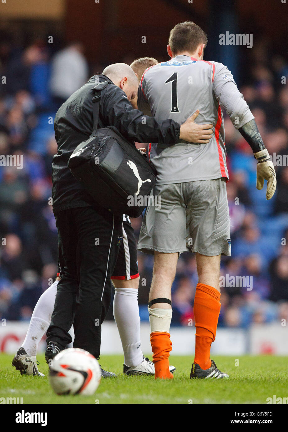 Dunfermline's goalkeeper Ryan Scully suffers a toe injury during the ...