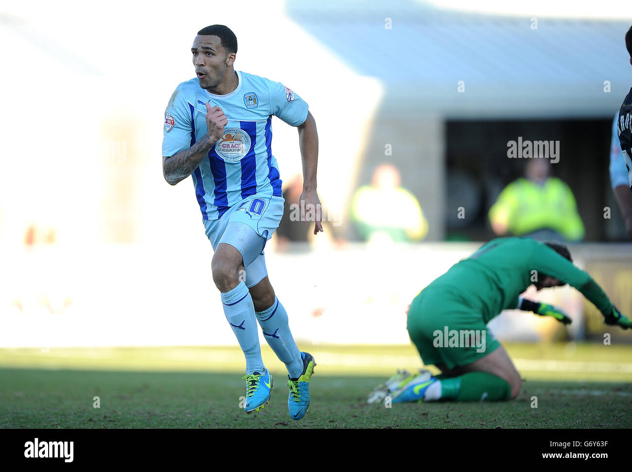 Coventry City's Callum Wilson turns away to celebrate after scoring his ...