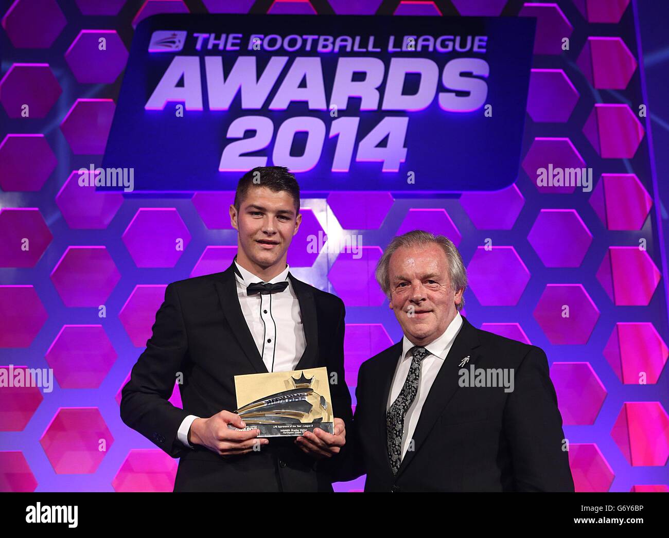 Hartlepool United's Bradley Walker (left) recieves his LFE Apprentice ...
