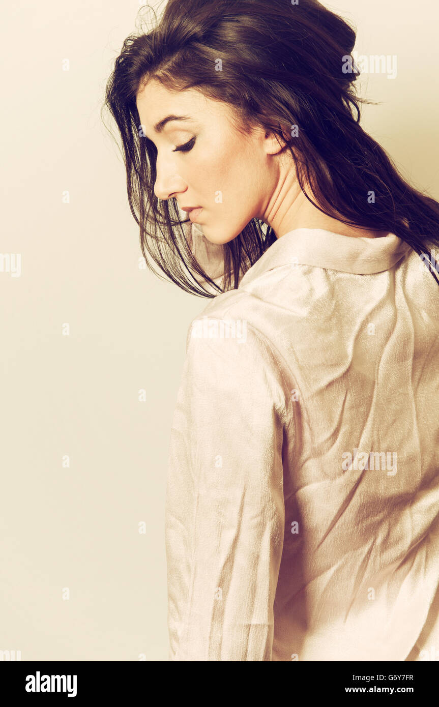 Portrait of a beautiful woman looking down Stock Photo - Alamy