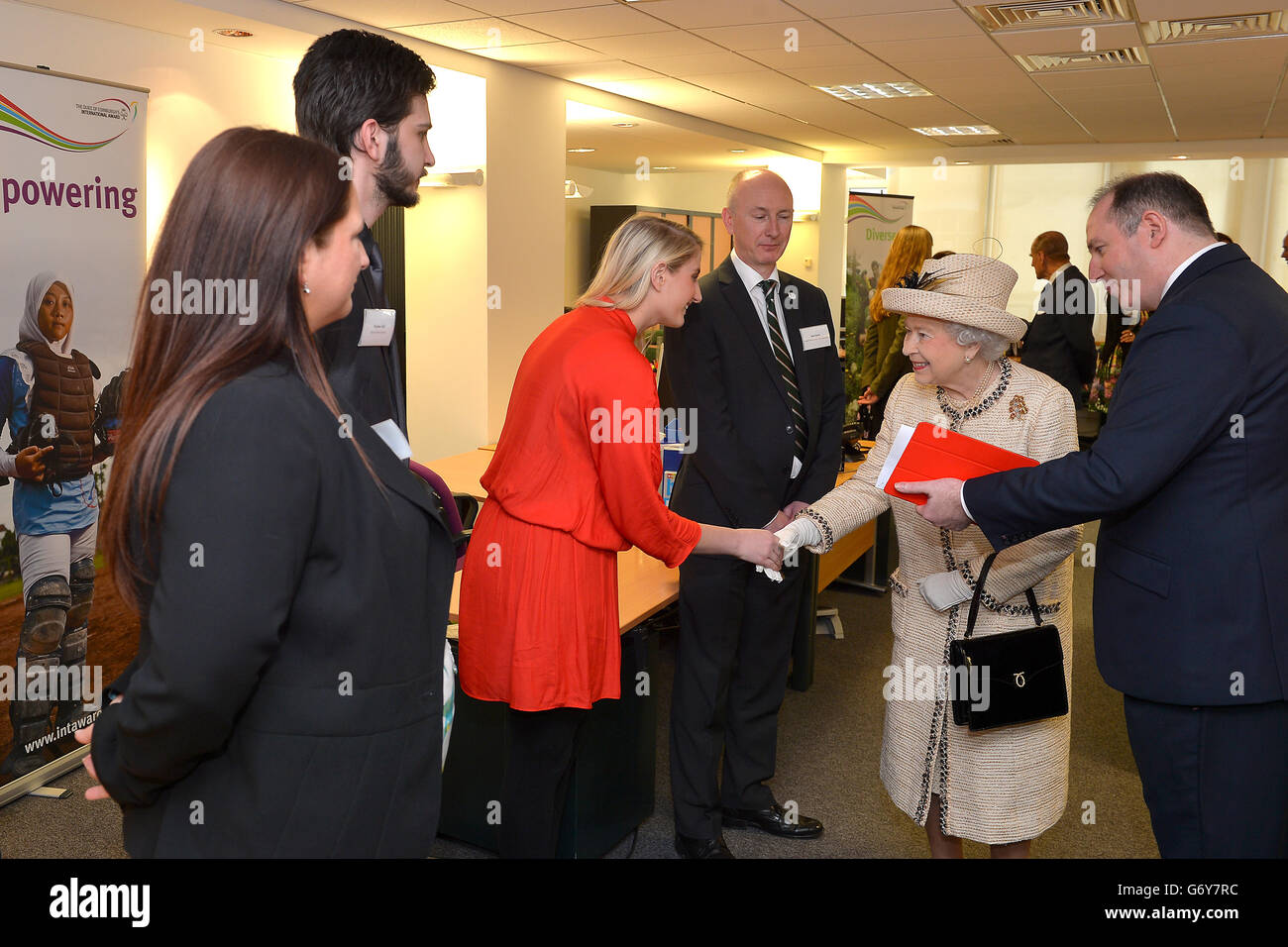 Queen Elizabeth II meets staff during her visit to the Royal ...