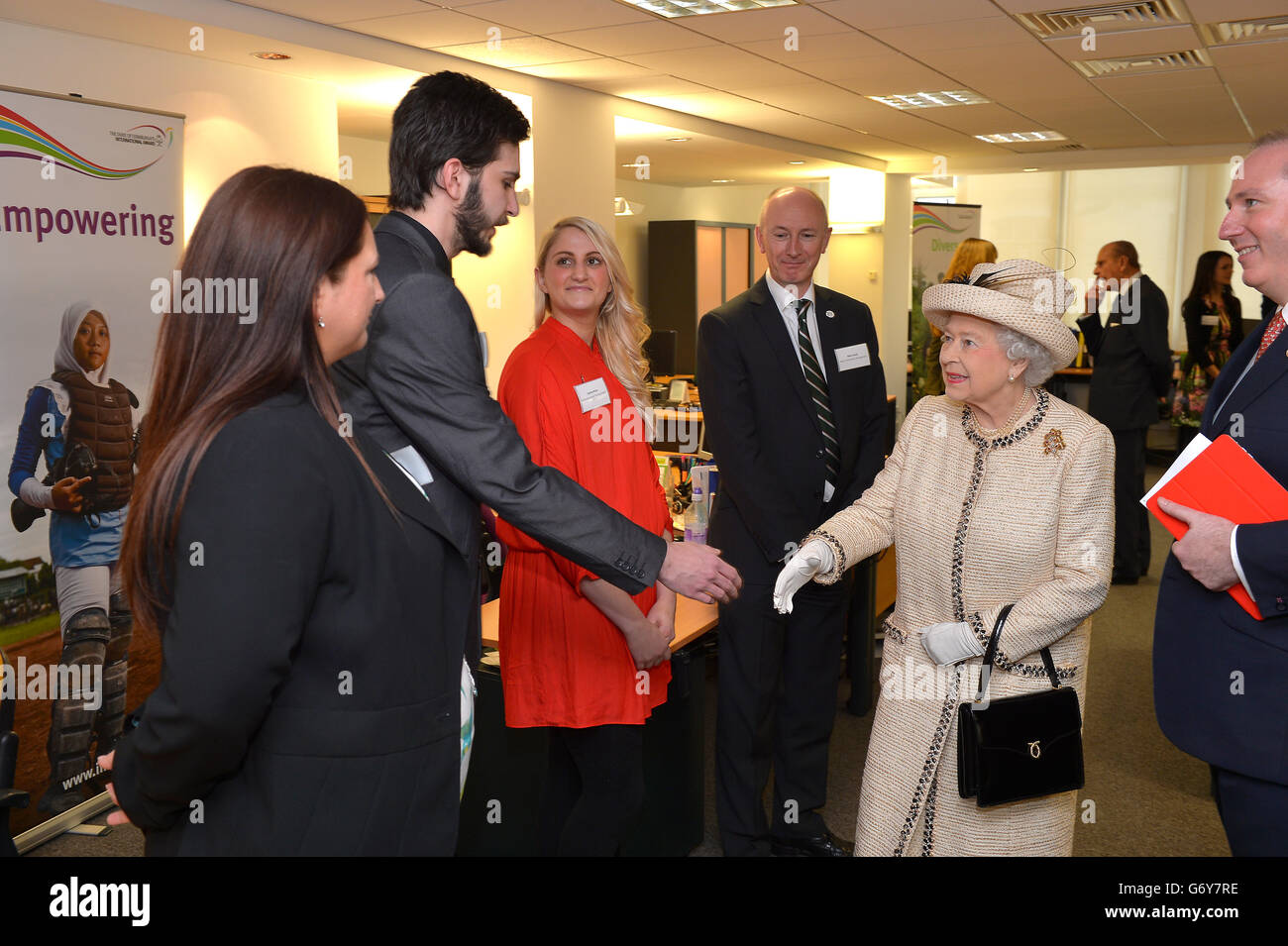 Queen Elizabeth II meets staff during her visit to the Royal ...