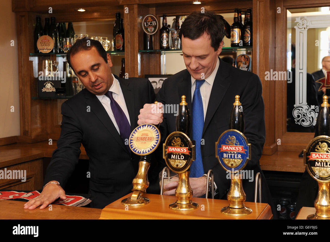 Chancellor George Osborne with a pint of Sunbeam ale alongside ...