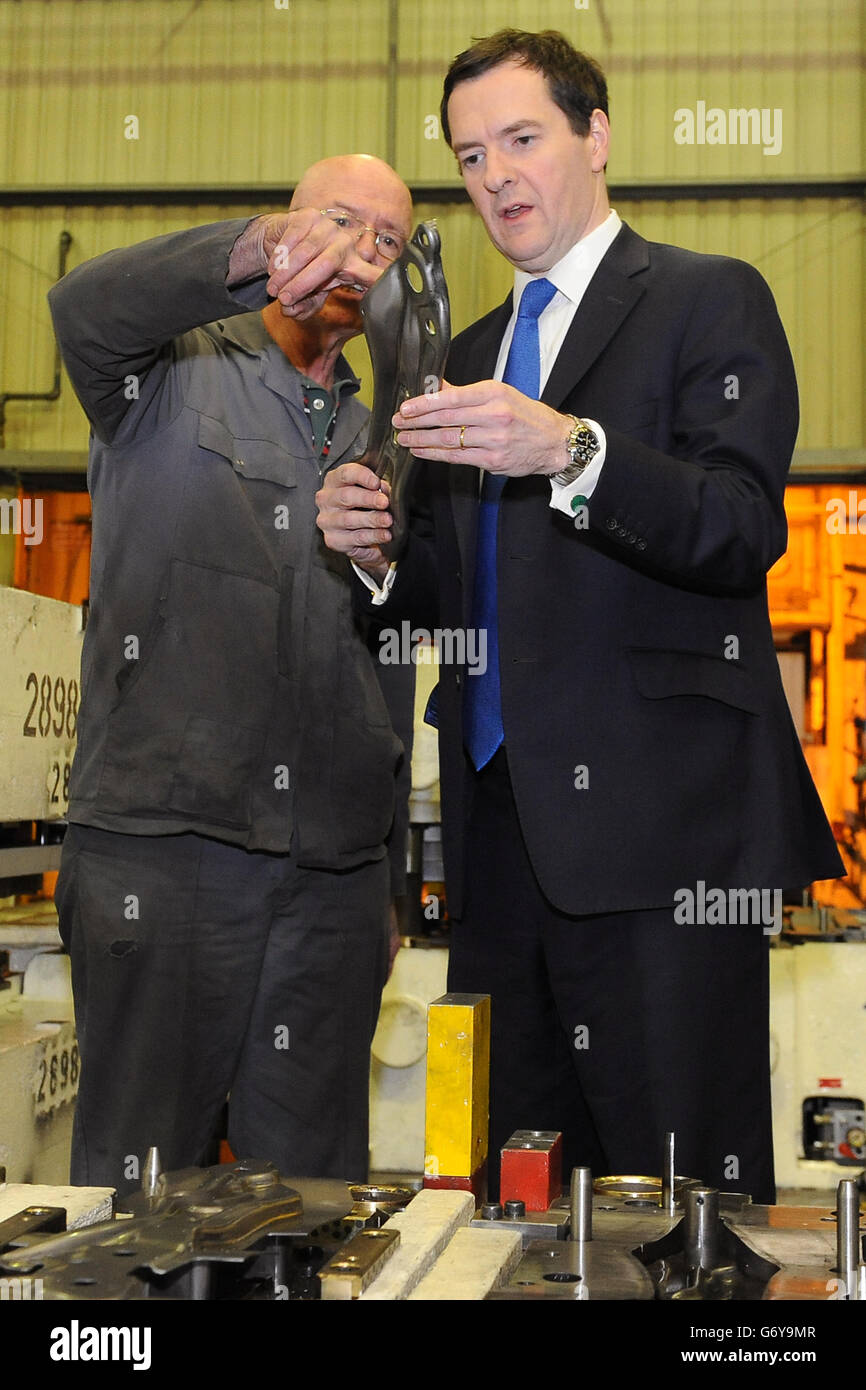 Chancellor George Osborne tries his hand at some engineering work with ...