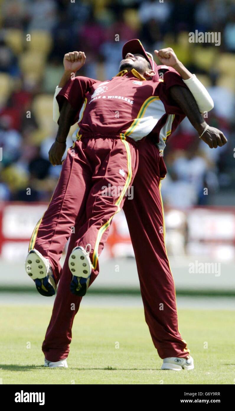West Indian cricketer Ramnaresh Sarwan receives a stretch from team ...