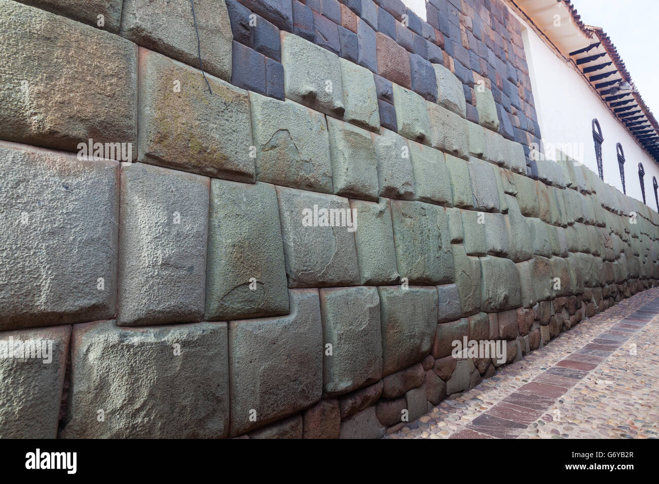 Incan foundation wall along Hatunrumiyoc alley in Cusco, Peru Stock ...