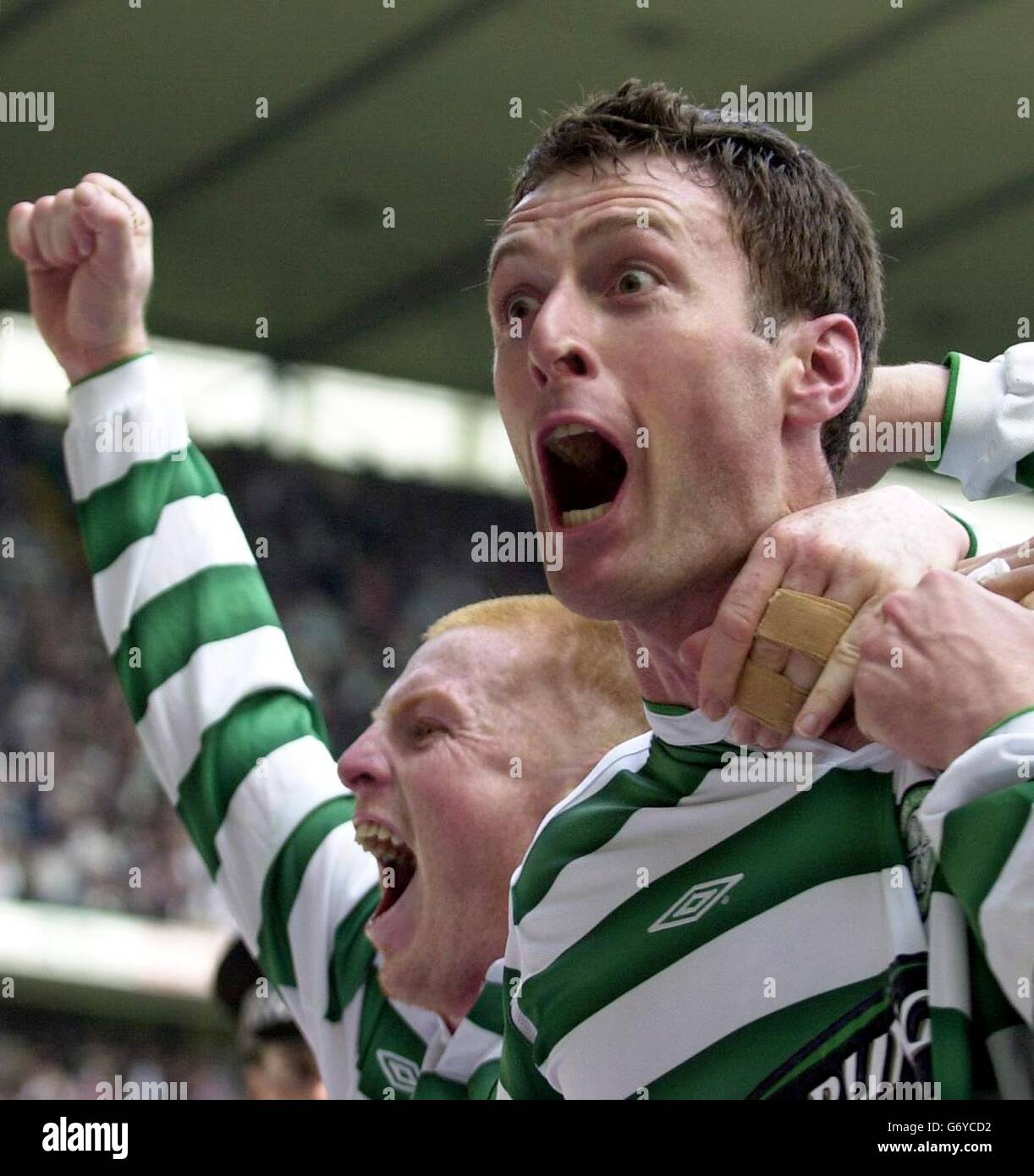 Celtics chris sutton right celebrates team mates scoring against ...