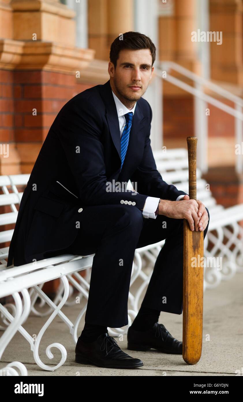 Middlesex's Steven Finn poses with a cricket bat from the Lords museum ...