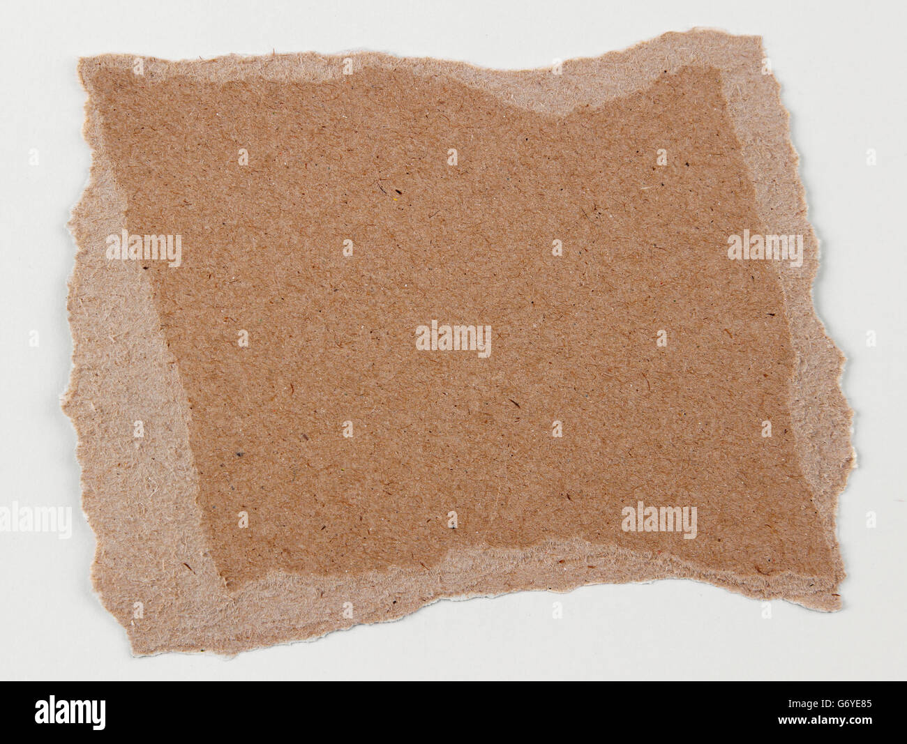 Piece of torn brown paper Stock Photo - Alamy