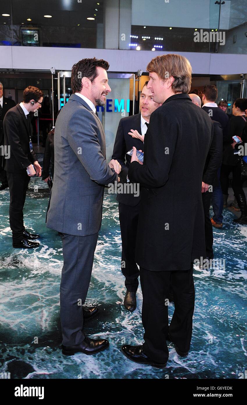 Hugh Jackman (left) and Tom Hooper (right) arriving for the premiere of ...