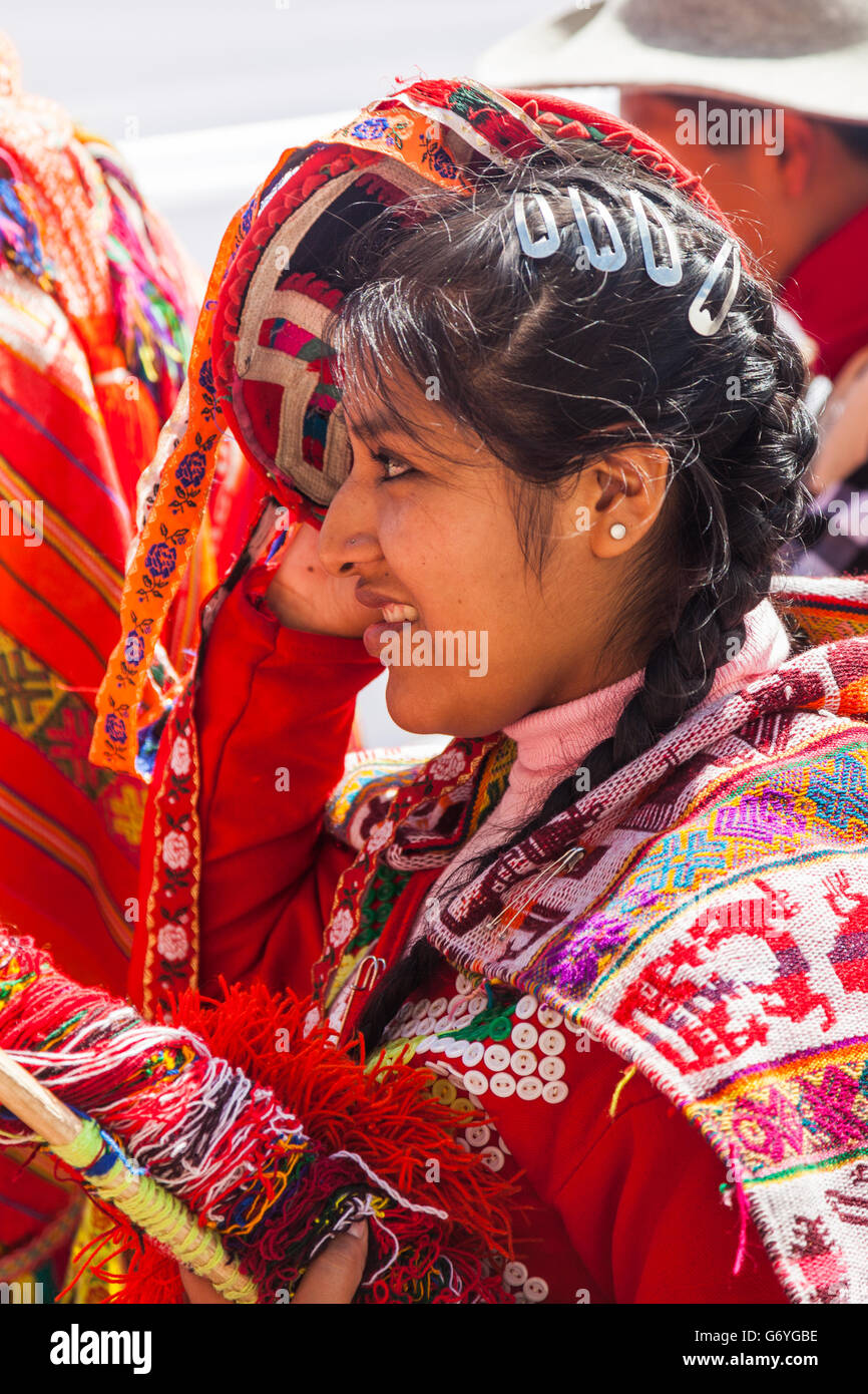 Young girl performer at a cultural dance troupe competition in Cusco ...