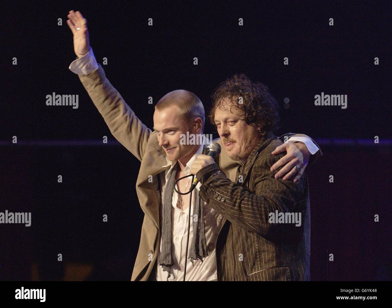 Singer Ronan Keating joins Italian singer Zucchero onstage during a ...