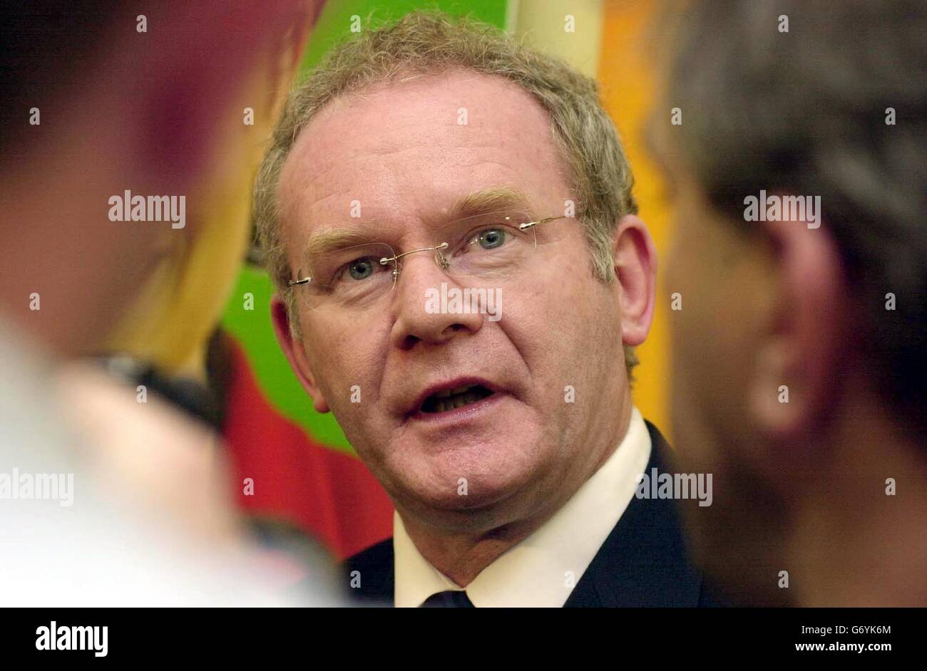 Sinn Fein's Martin McGuinness talks to the press inside the offices of ...