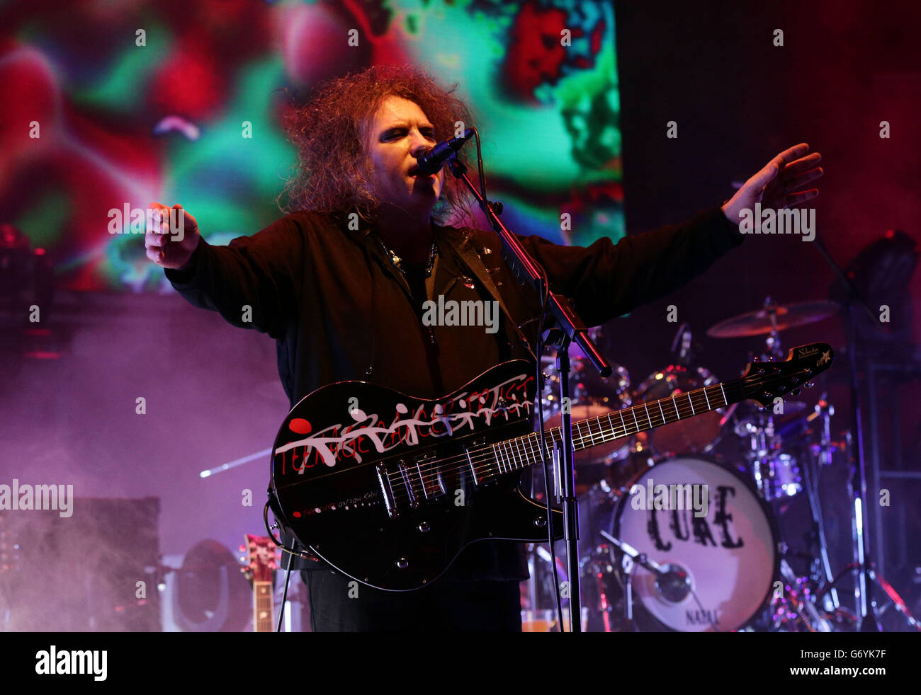 Robert Smith of The Cure performing on stage during the Teenage Cancer ...