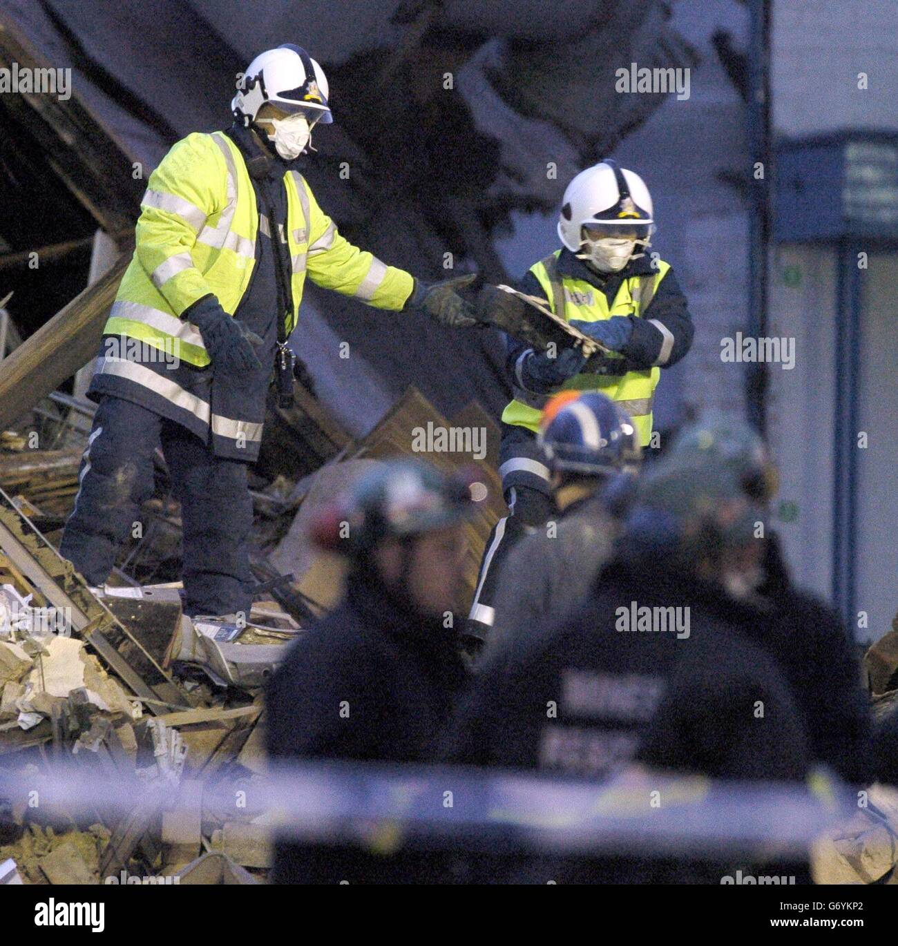 Firemen work throughout the night, at the scene of the Stockline ...