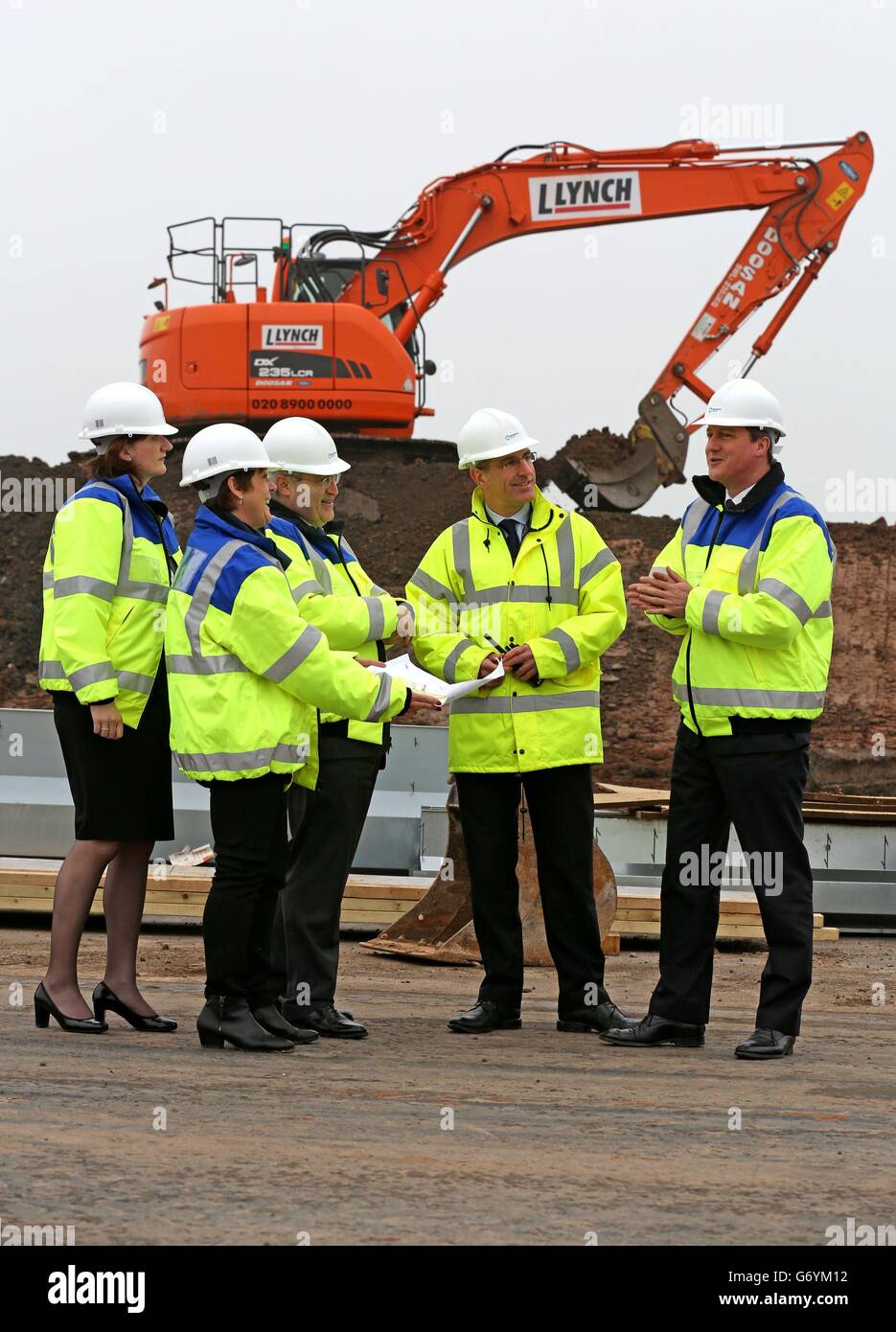Prime Minister David Cameron and Caroline Spelman MP (second left) chat ...