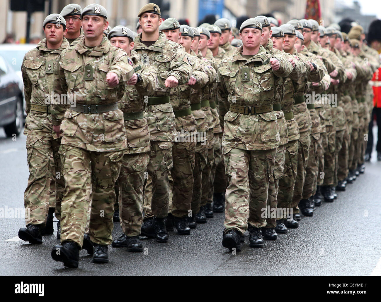 Royal Scots Dragoon Guards march through the streets of Glasgow during ...