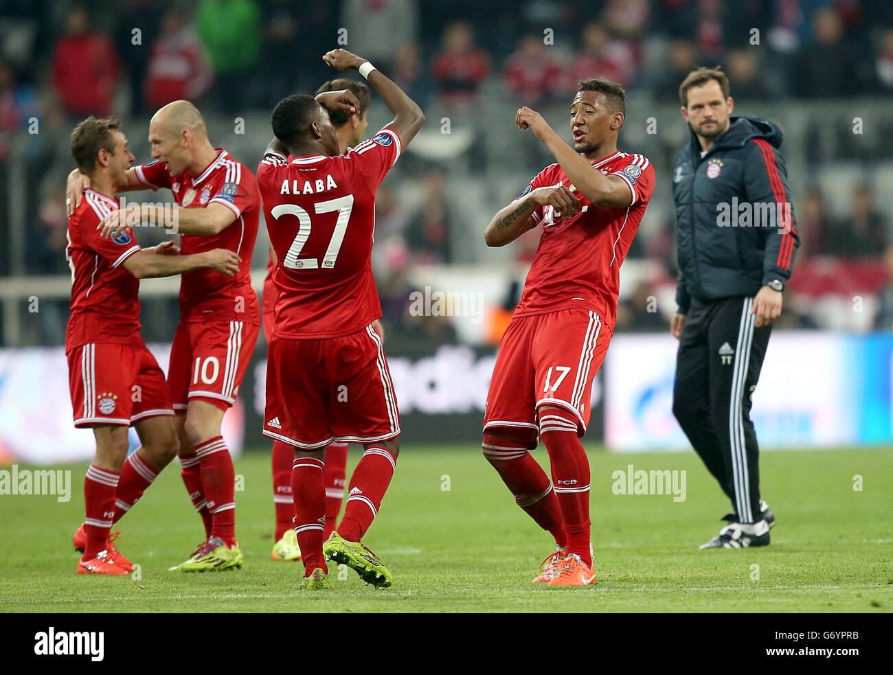 Bayern Munich's David Alaba (27) and Jerome Boateng celebrate after the ...