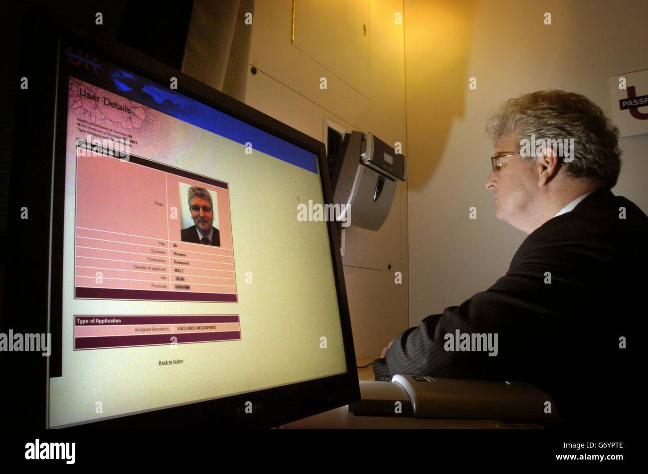 Home Office Minister Des Browne, MP having a Biometric identity card ...