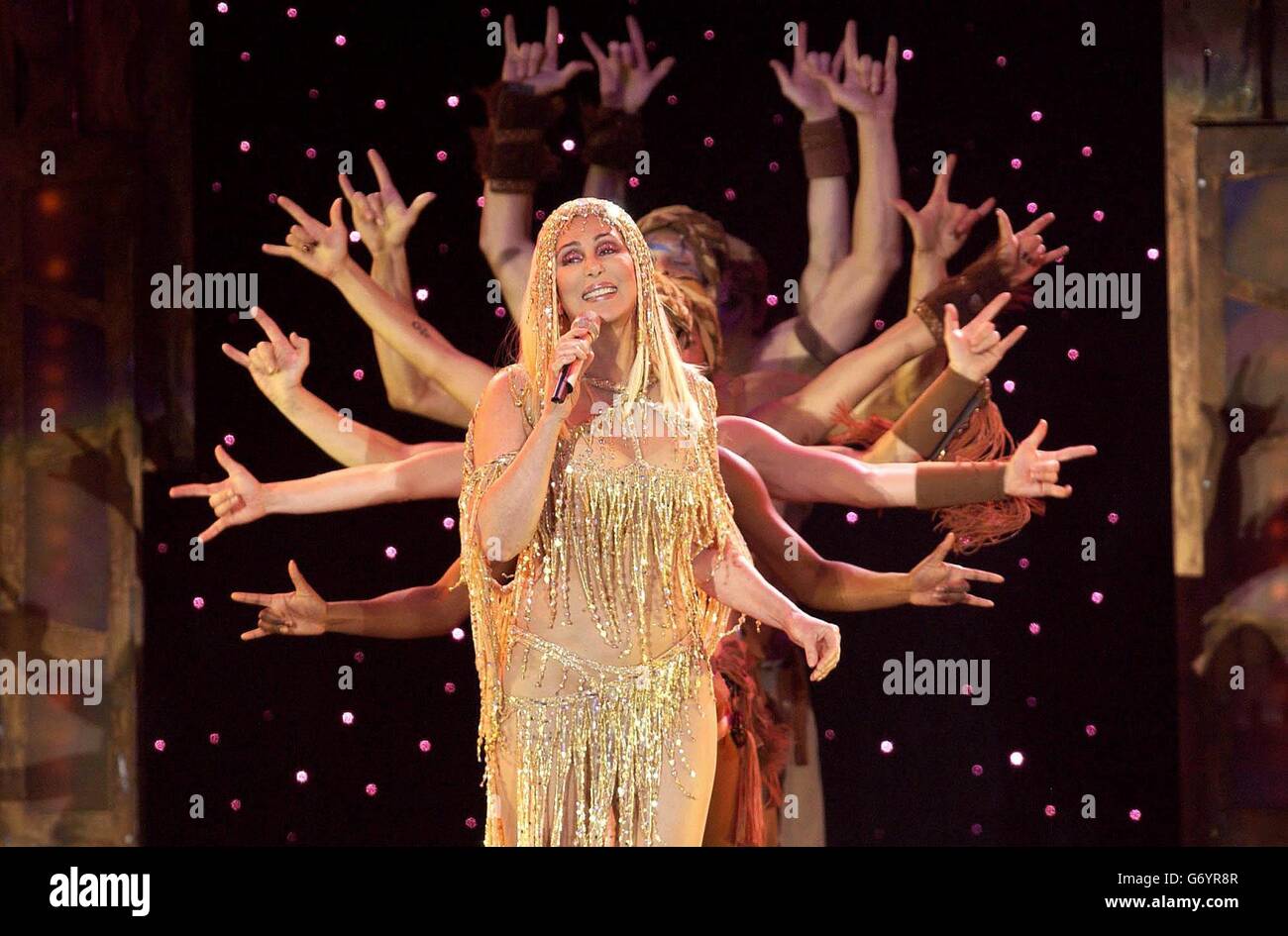 Singer Cher performs live on stage at Wembley Arena in north London as ...