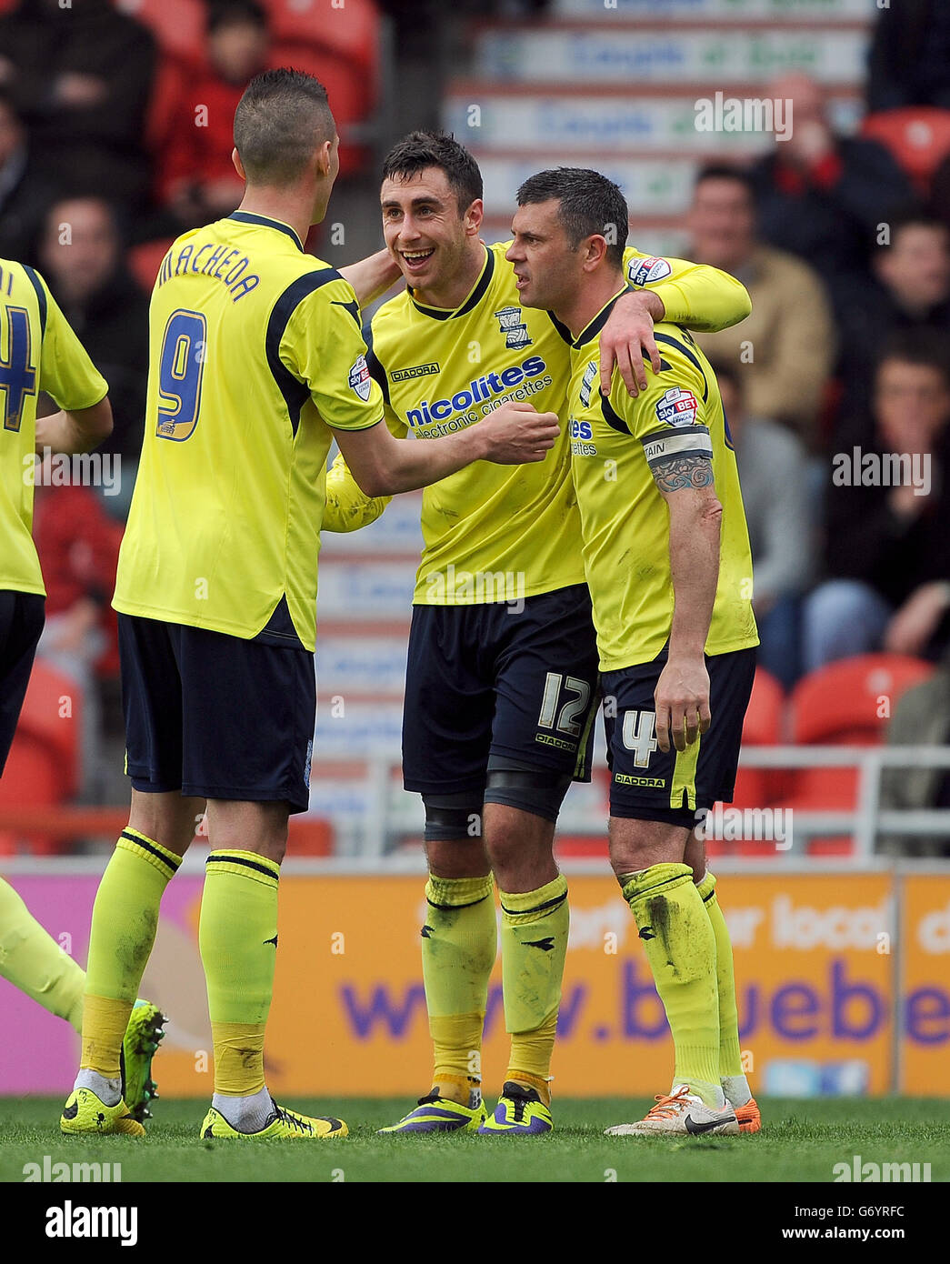 Birmingham City's Lee Novak (centre) celebrates with Federico Macheda ...