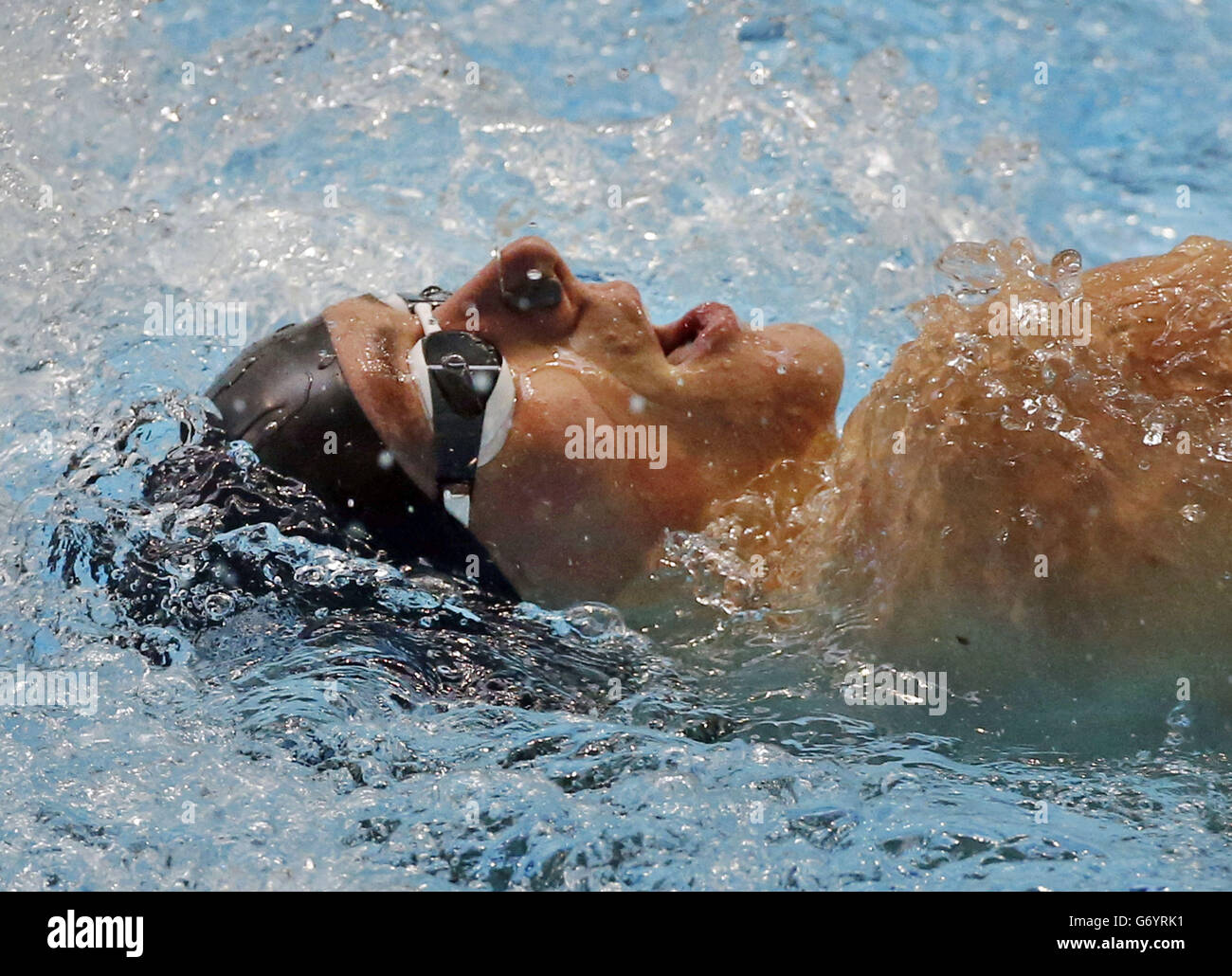 Robert Renwick competes in the Mens Open 100m Backstroke heat 3 during ...