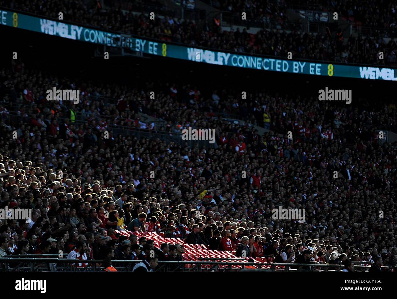 A general view of the crowd and the 96 seats that are being left empty ...