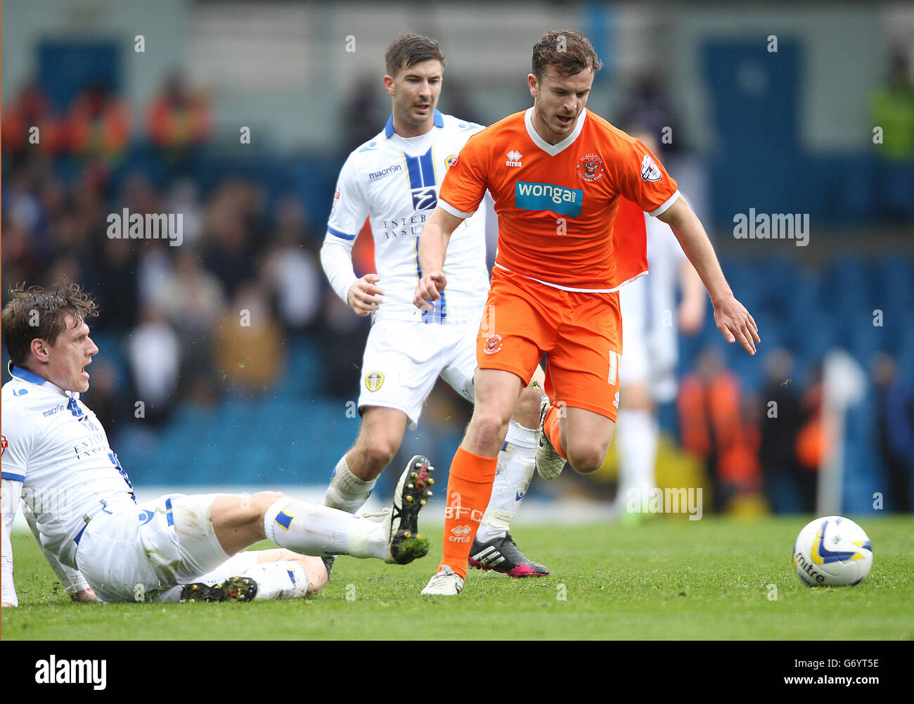 Leeds United's Luke Murphy, Marius Zaliukas and Blackpool's Andy ...