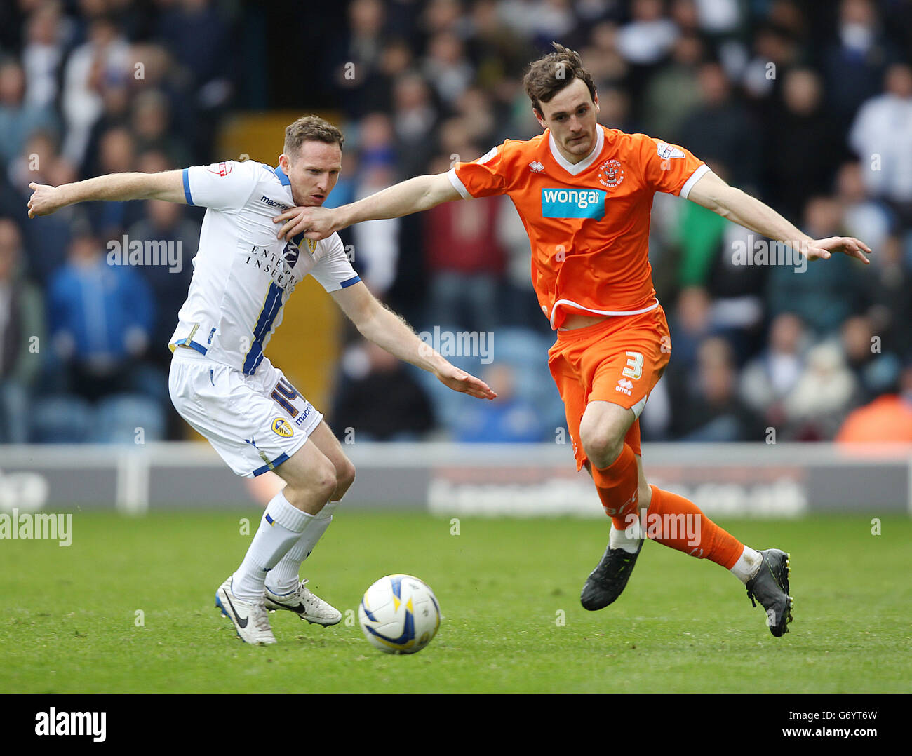 Leeds uniteds aiden white and blackpools jack robinson hi-res stock ...