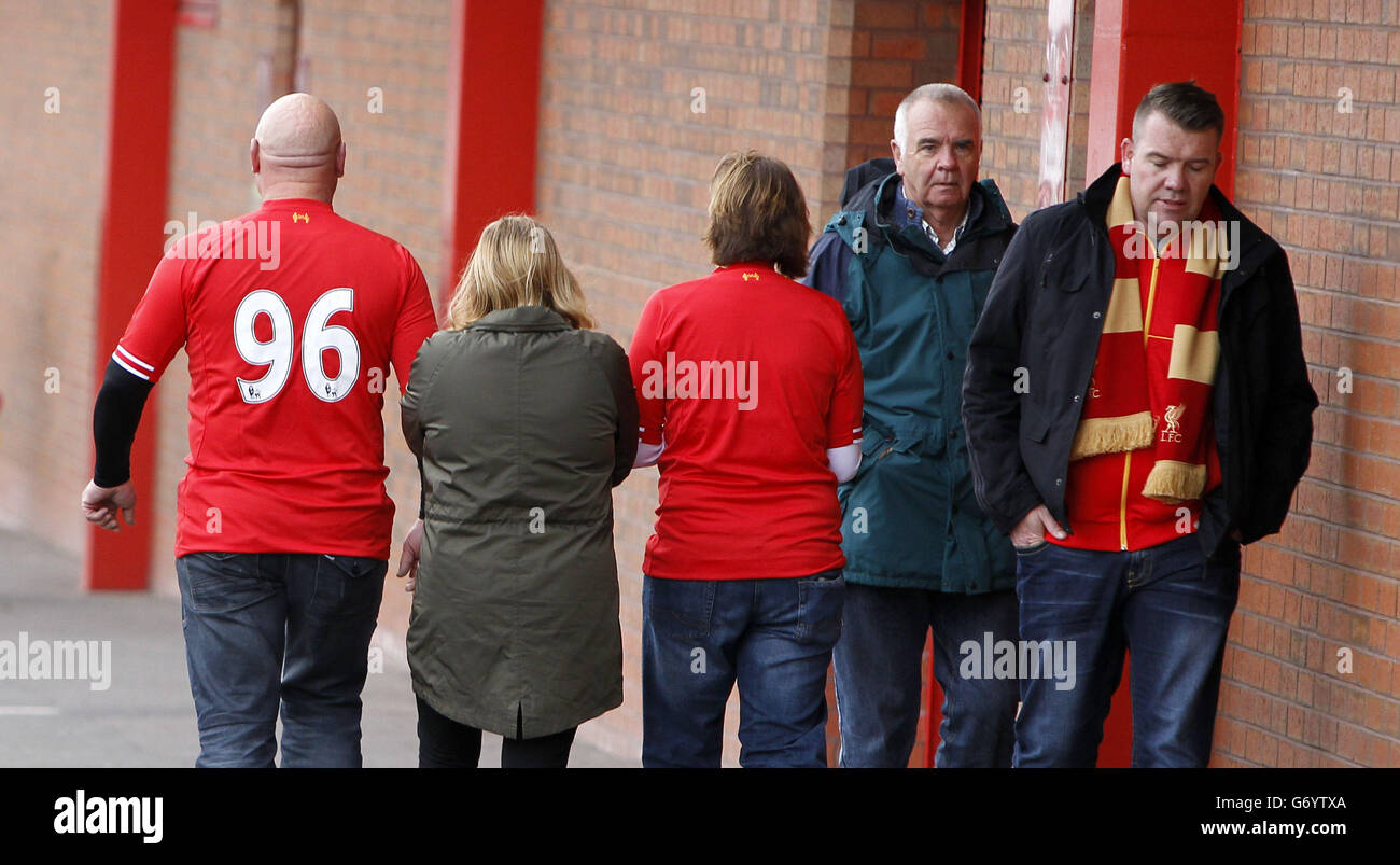A fan arrives wearing a '96' shirt in memory of the Hillsborough ...