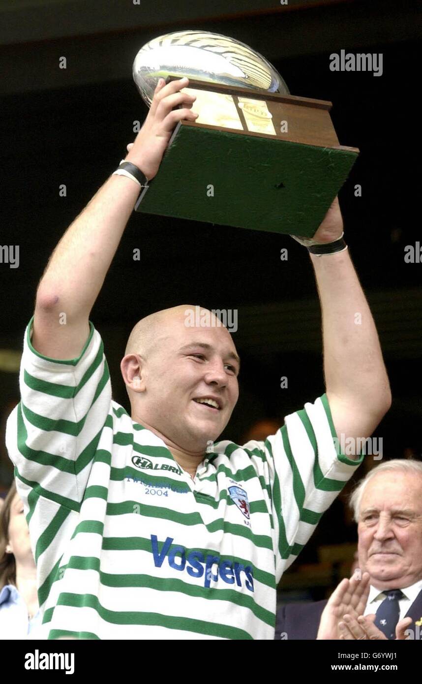 Devon's Captain Chris Lowrie holds the Tetley's County Championship ...