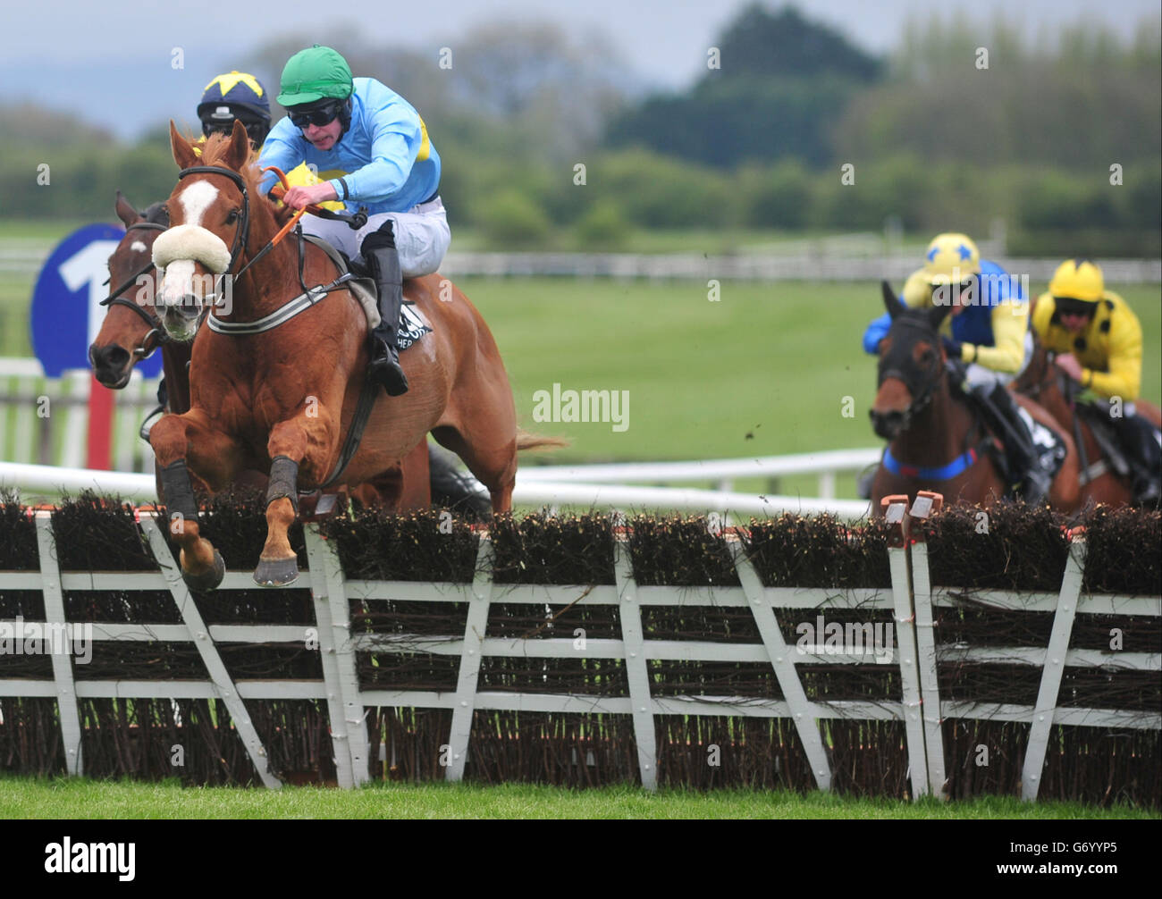Jockey David Splaine (left) rides Pivot Bridge to victory in the ...