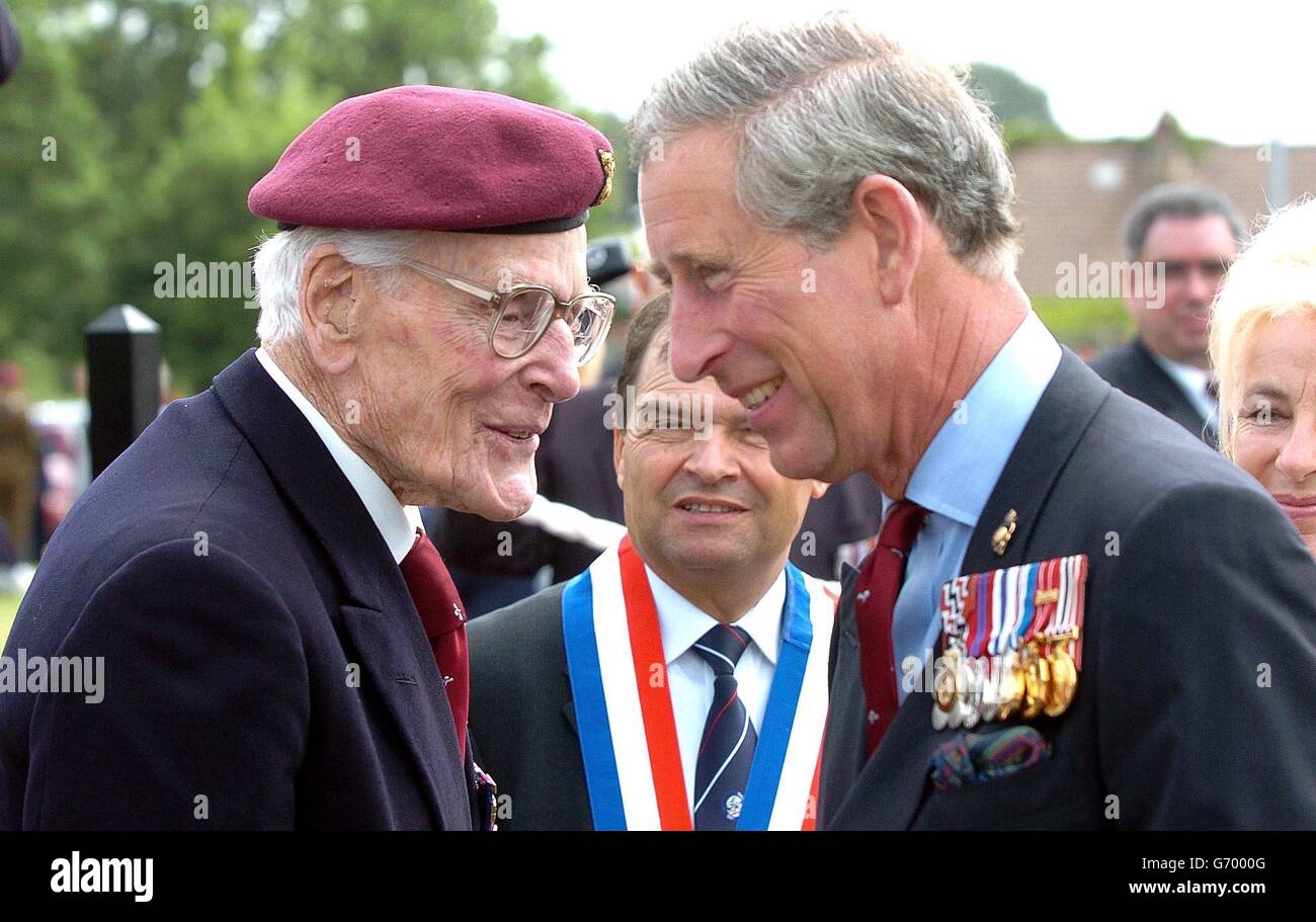 The Prince of Wales greets Brigadier Sir James Hill, before unveiling a ...