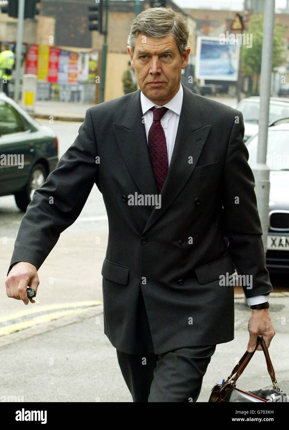 Prosecution QC Richard Latham arrives at Nottingham Crown Court, where ...