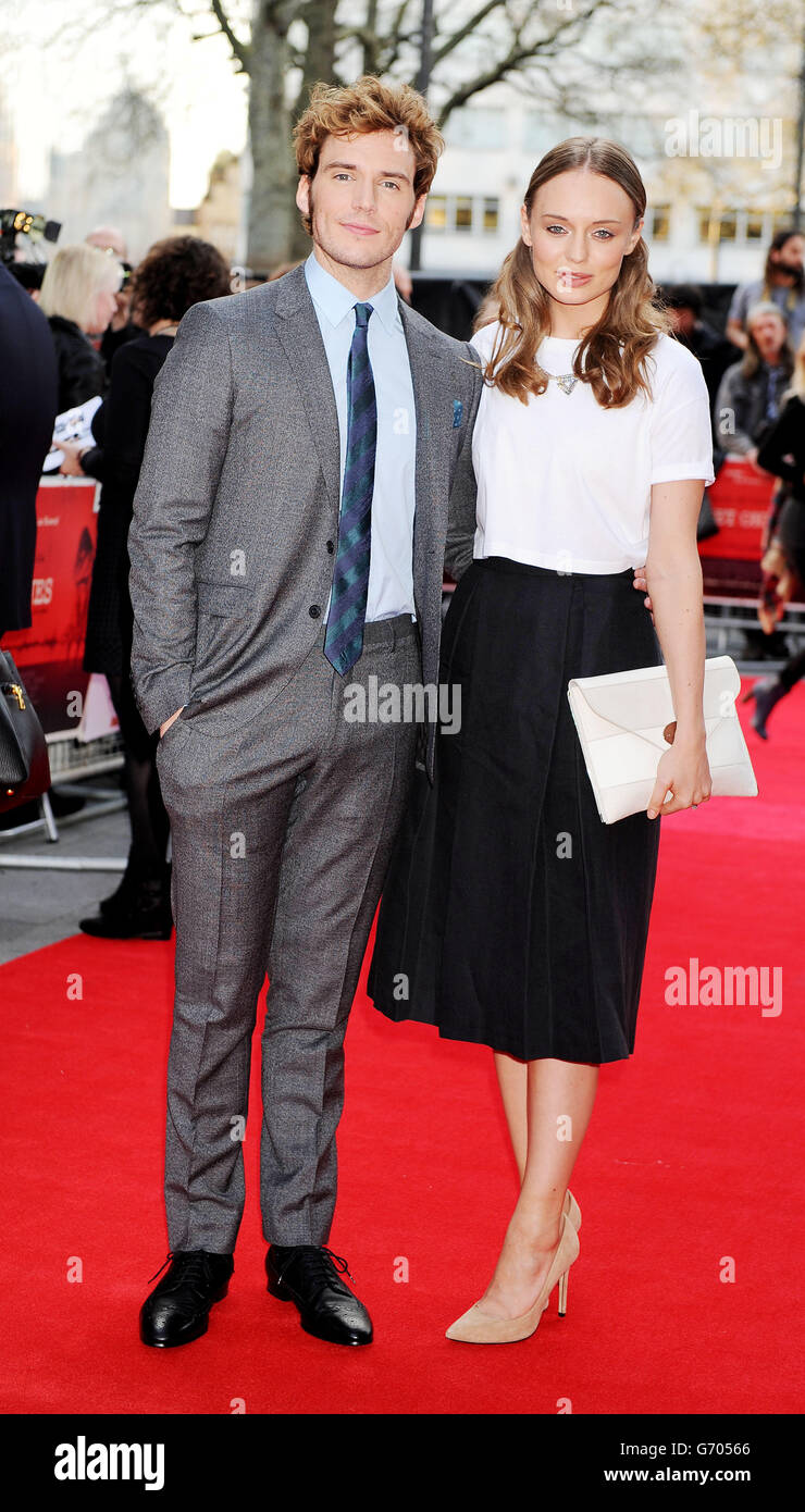 Sam Claflin and his wife Laura Haddock arrive for the premiere of The ...
