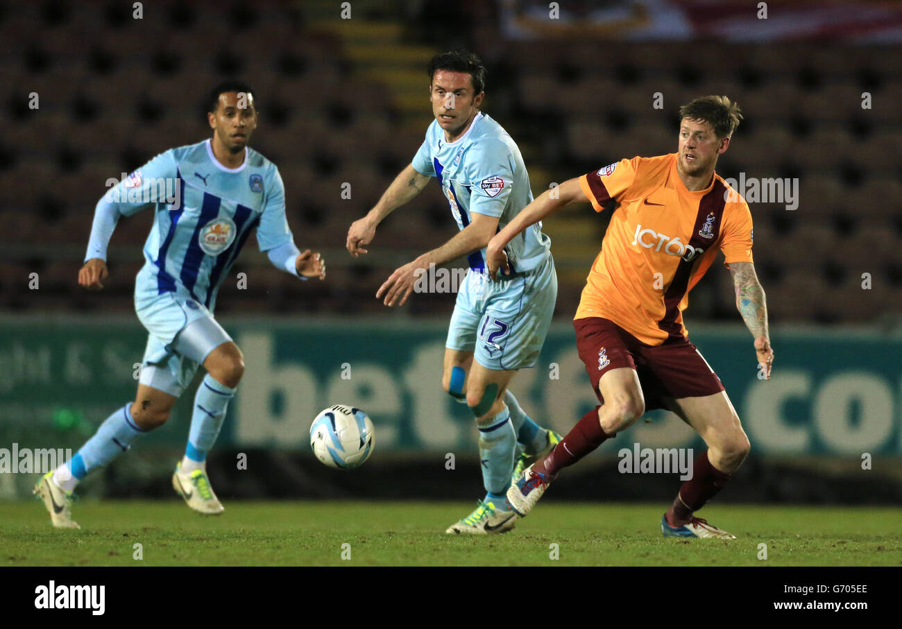 Coventry City's David Prutton wins the ball beating Bradford City's Jon ...
