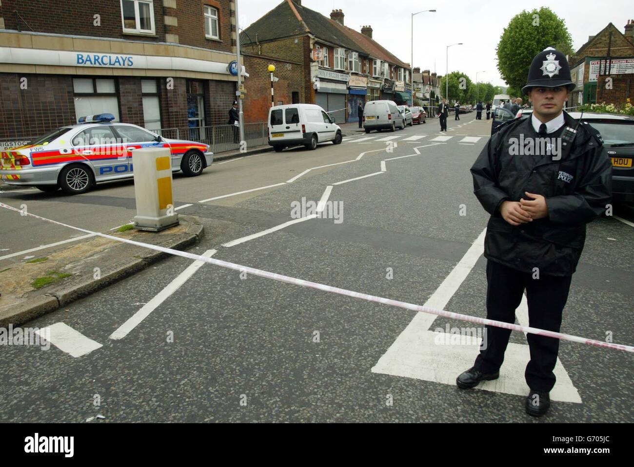 Police at the scene where a man was shot dead by an officer from the ...