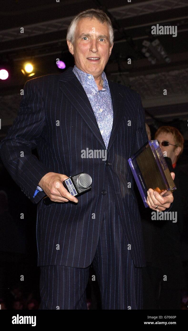 Radio 2 DJ Johnnie Walker after receiving the Gold Award on stage ...